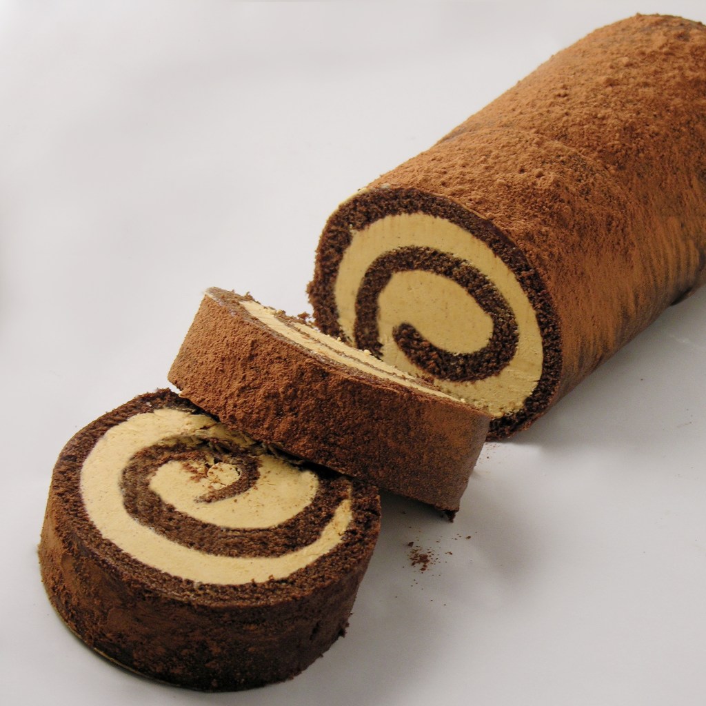 Chocolate Cake Roll with a Cinnamon Caramel Filling | EASYBAKED